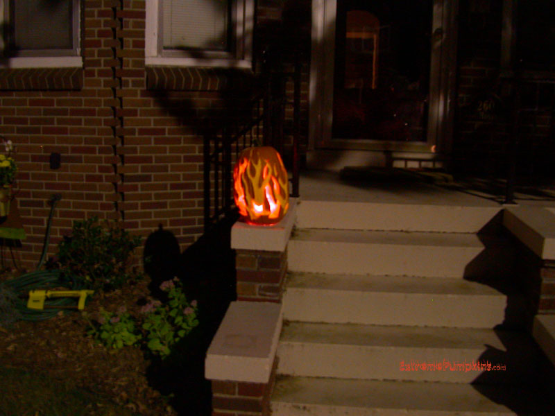 Flame Job Pumpkin on our porch.
